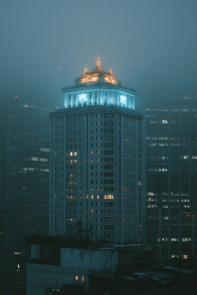 Skyscrapers with Neon-lit Rooftop Designs